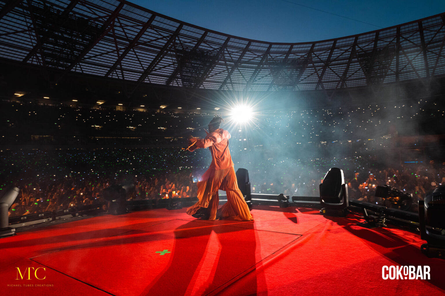 Burna Boy Makes A Resounding Fashion Statement In Concert: Wearing An ...